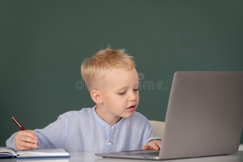 Cute Little Child Using Laptop Computer, Kid Boy Studying through ...