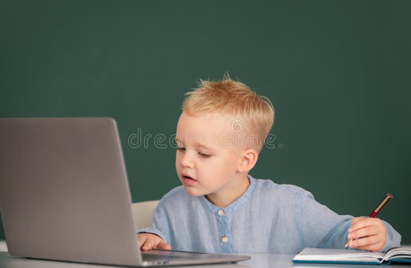 Cute Little Child Using Laptop Computer, Kid Boy Studying through ...