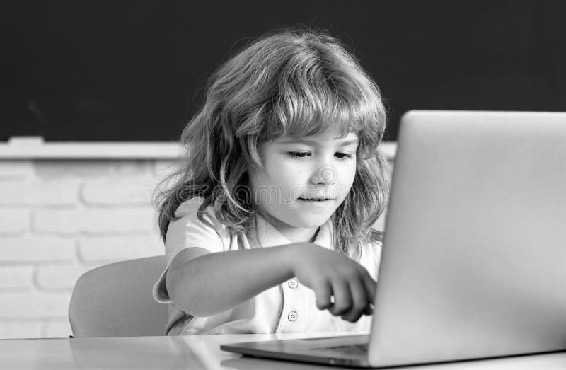 Cute Little Child Using Laptop Computer, Kid Boy Studying through ...