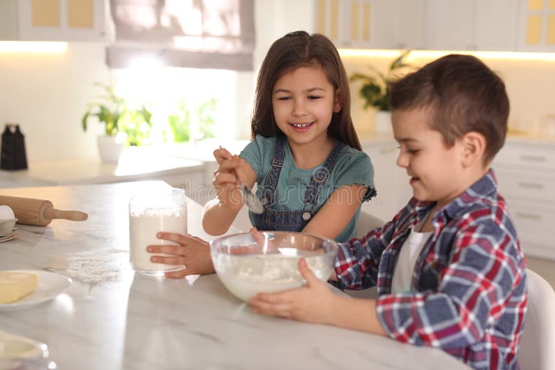 Cute Little Children Cooking Dough in Kitchen Stock Photo - Image of ...