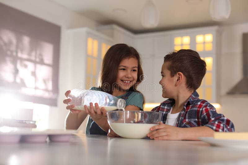 Cute Little Children Cooking Dough in Kitchen Stock Photo - Image of ...