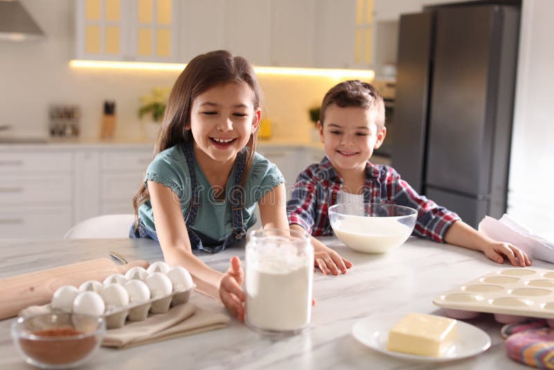 Cute Children Cooking Dough in Kitchen at Home Stock Photo - Image of ...