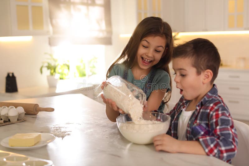 Cute Little Children Cooking Dough in Kitchen Stock Photo - Image of ...