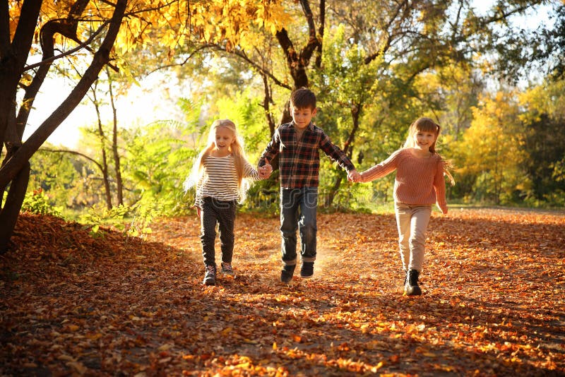 Cute Little Children Having Fun in Autumn Park Stock Photo - Image of ...