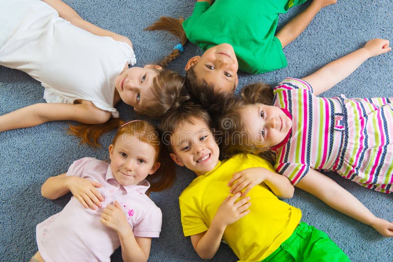 Cute Little Children Lying on Floor Stock Image - Image of indoors ...