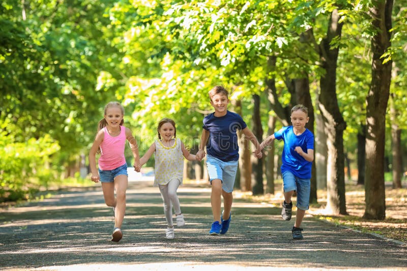 Cute Little Children Playing in Green Park Stock Image - Image of ...