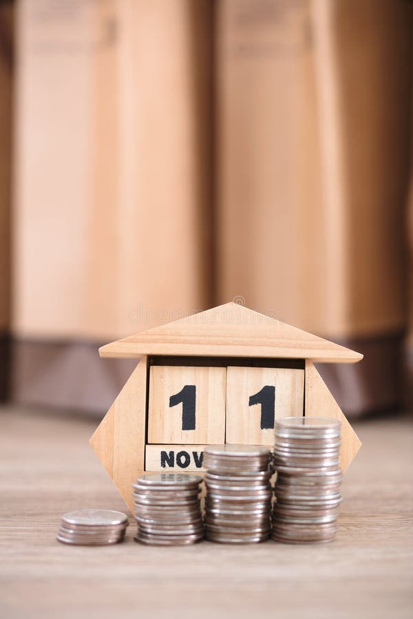 Cute Little Desk Calendar Showing the Number 11 and Incrementing Dollar ... Cute Little Desk Calendar Showing the Number 11 and Incrementing Dollar ...