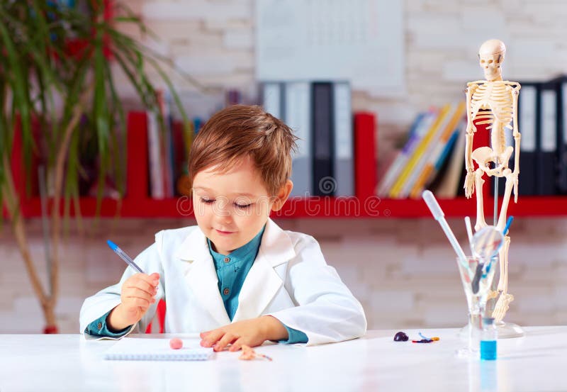 Cute Little Doctor Writing Notes in Lab Stock Photo - Image of medicine ...