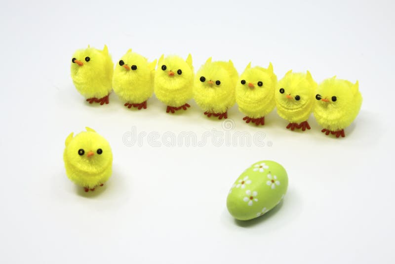 Cute Little Easter Chicks Standing in a Row with an Easter Egg Stock ...