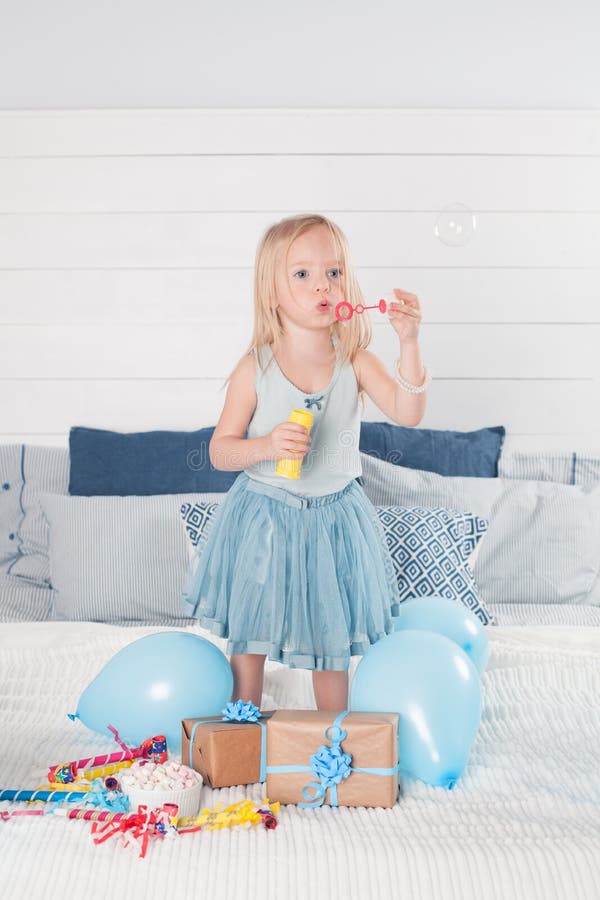 Laughing Little Girl Blowing Bubbles. Cute Child Stock Image - Image of ...