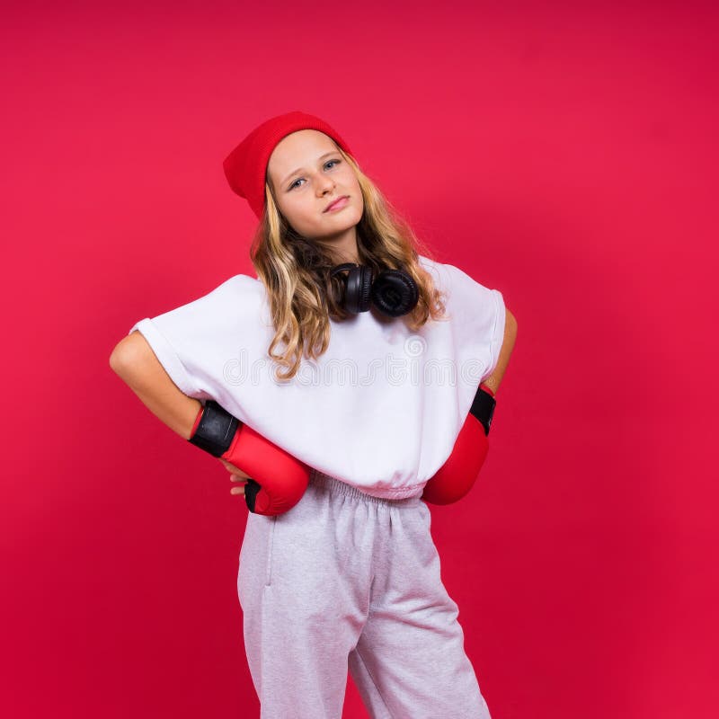 Cute Little Girl in Boxing Gloves on Red Background Studio Stock Photo ...