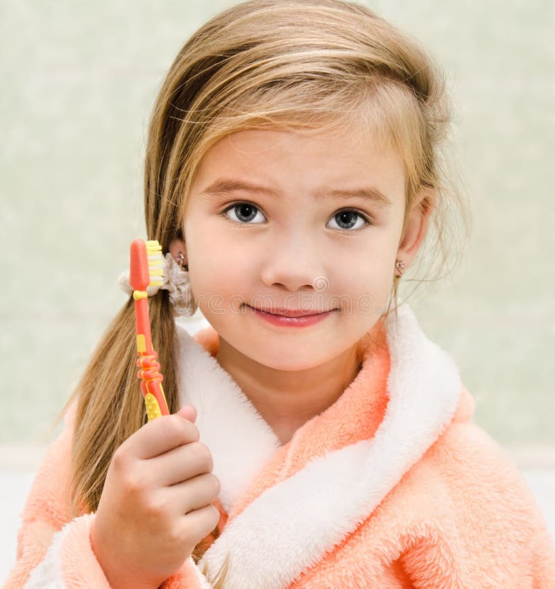 Cute Little Girl with Brush Stock Photo - Image of face, holding: 36040014