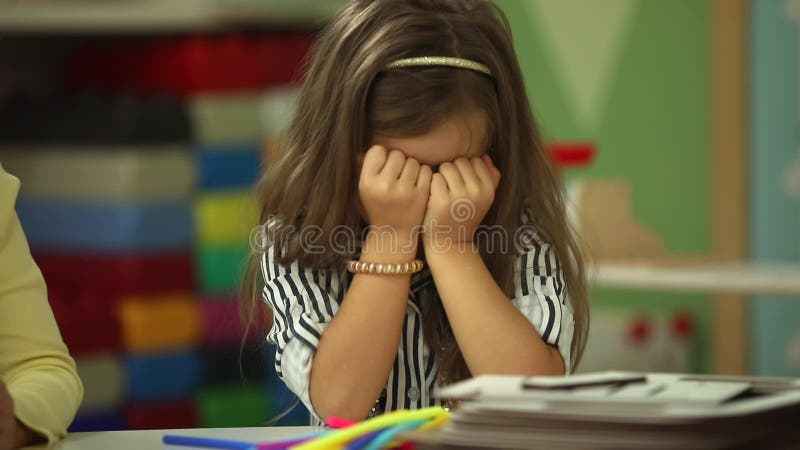 Cute Little Girl Crying in Kindergarten Classroom Stock Footage - Video ...