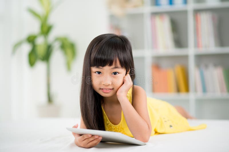 Cute Little Girl with a Digital Tablet Stock Photo - Image of child ...