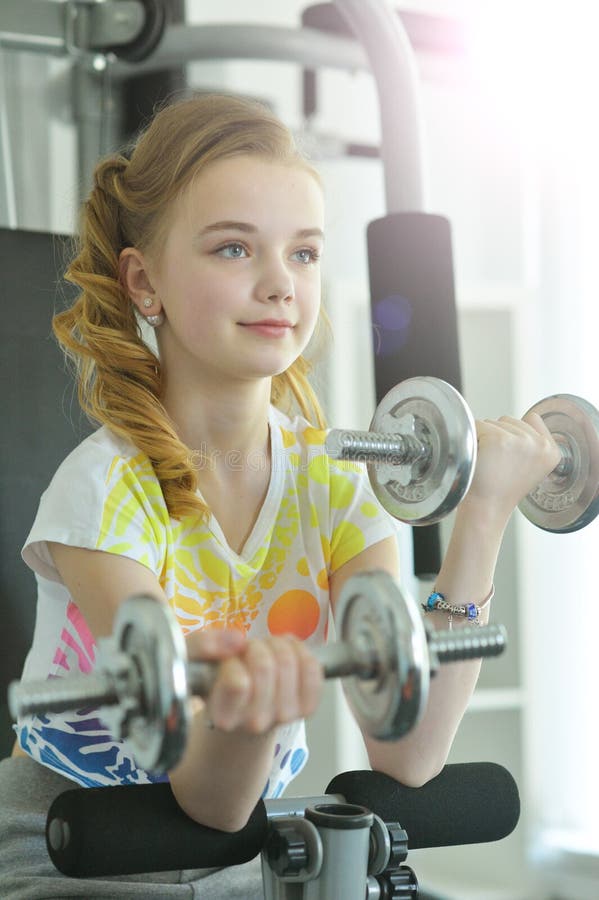 Cute Little Girl Doing Exercises Stock Photo - Image of youthful ...