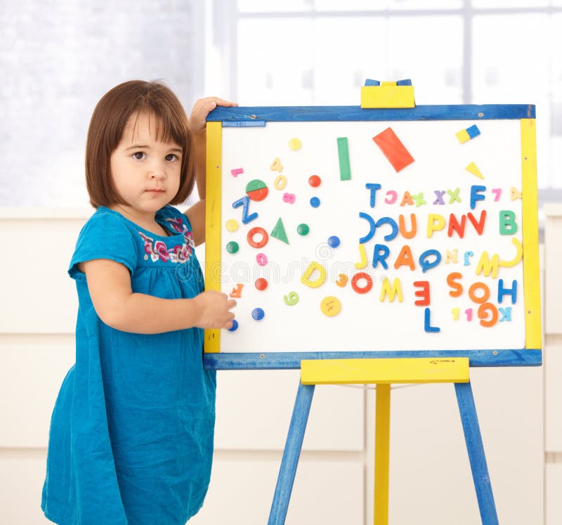Cute Little Girl with Drawing Board Stock Photo - Image of girl, brown ...