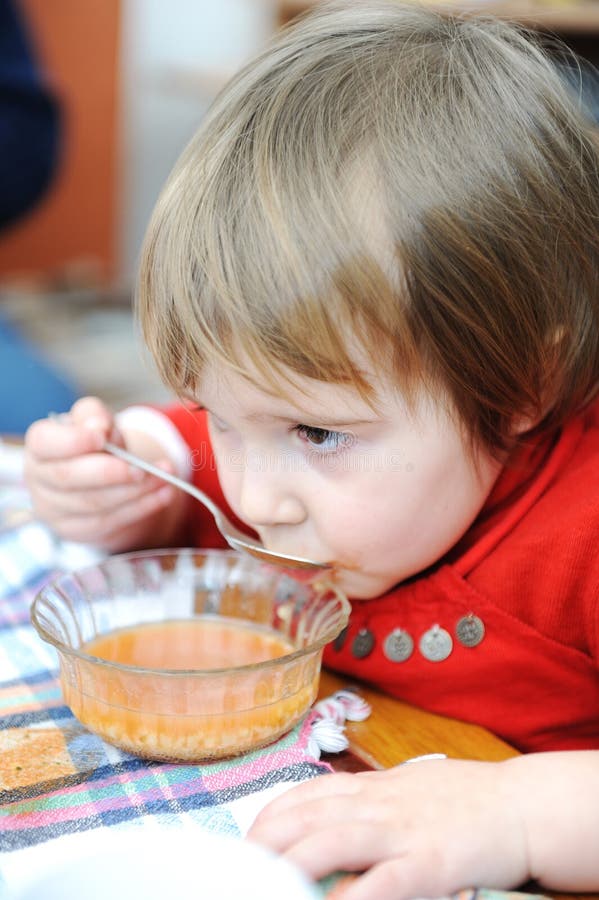 Cute little girl eating stock photo. Image of healthy - 17990736