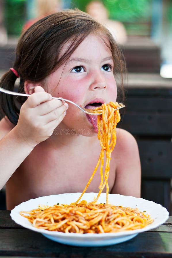 Cute Little Girl Eating Pasta Stock Image - Image of child, nutritive ...
