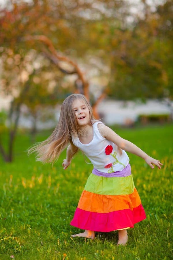 Cute Little Girl Having Fun in Summer Park Stock Image - Image of lawn ...