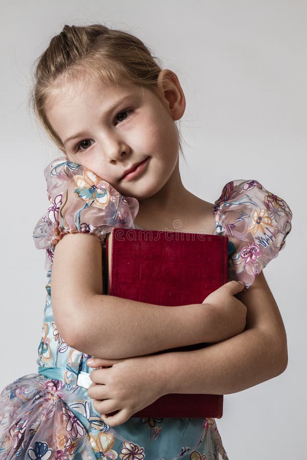 729 Little Girl Hugging Book Stock Photos - Free & Royalty-Free Stock ...