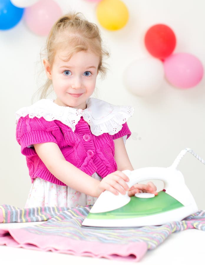 Child ironing clothes stock image. Image of steam, female - 30280649
