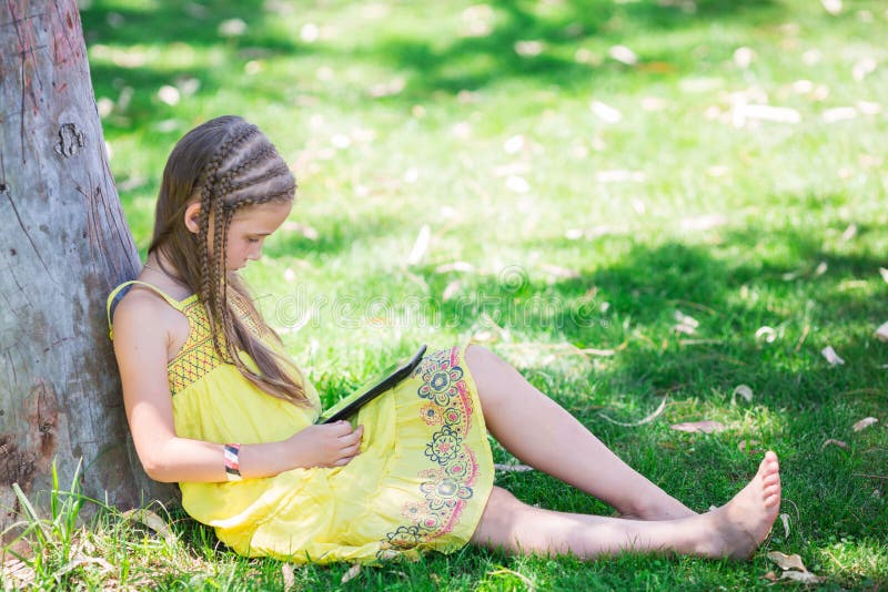 Cute Little Girl Learning with Tablet Pc Stock Image - Image of happy ...
