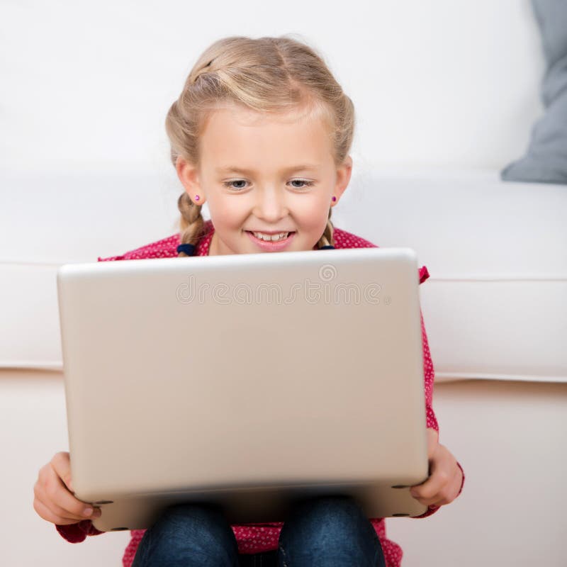 Girl Child Using Laptop Computer at Home Stock Image - Image of ...