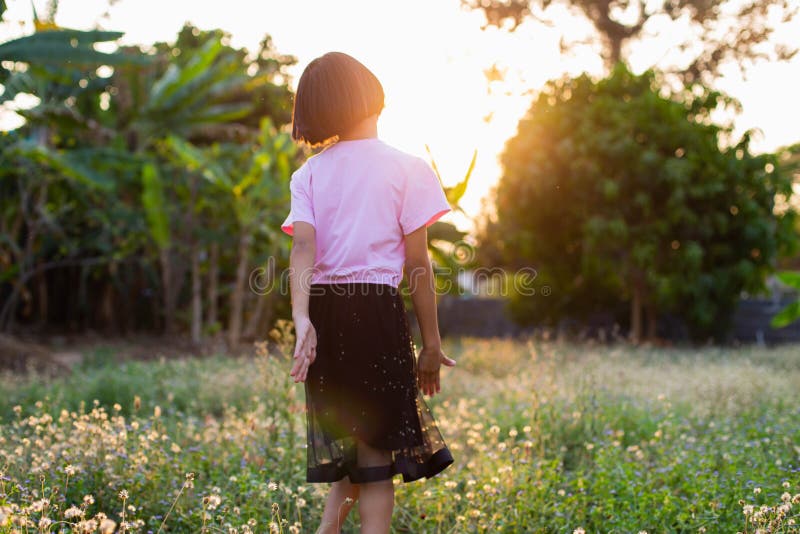 Cute Little Girl on the Meadow Stock Photo - Image of happy, meadow ...