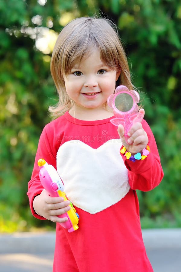 Cute Little Girl on the Meadow in Spring Day Stock Photo - Image of ...