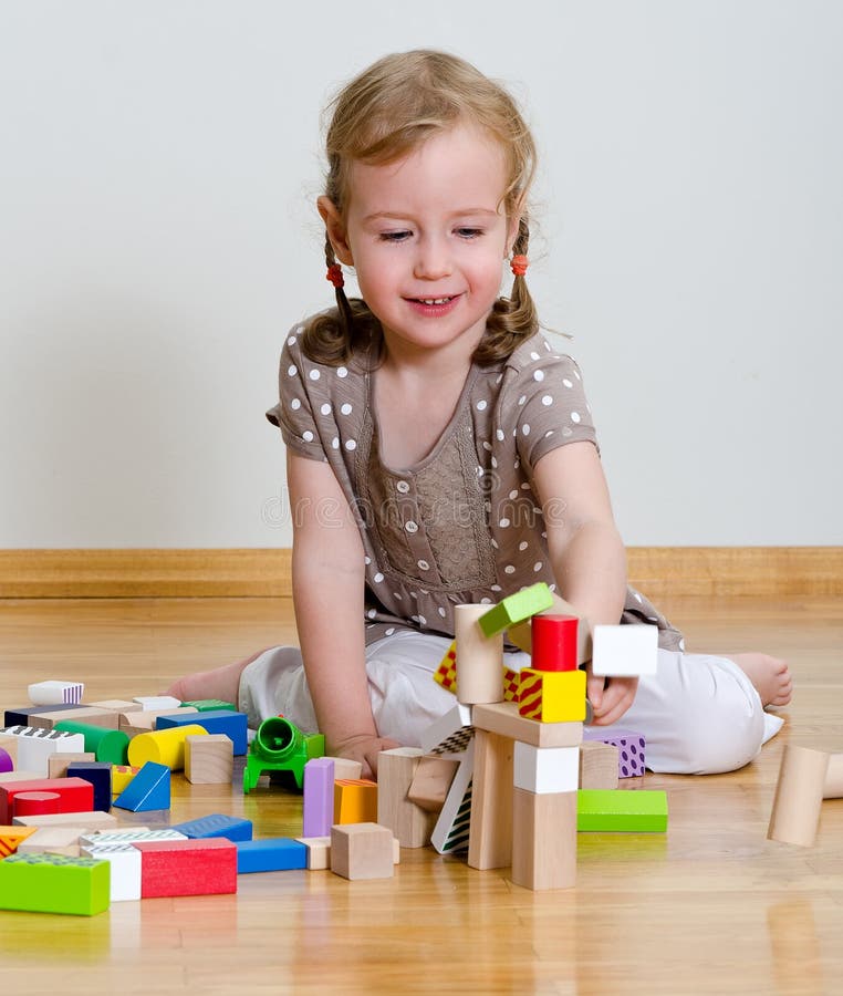 Cute Little Girl Playing with Building Blocks Stock Image - Image of ... Cute Little Girl Playing with Building Blocks Stock Image - Image of ...