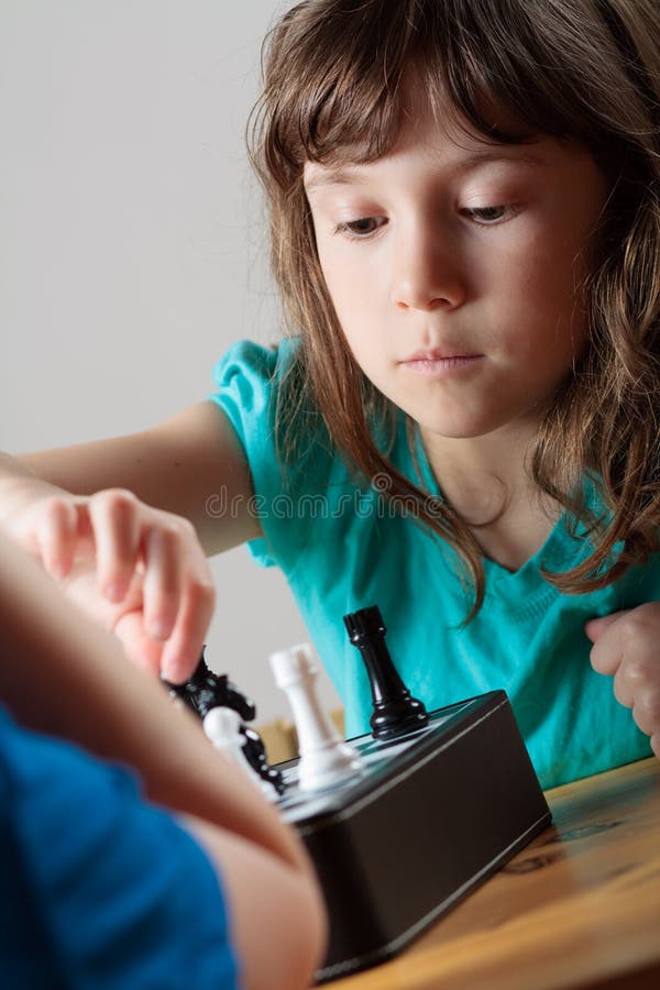 Girl playing chess stock image. Image of board, cute - 29946091
