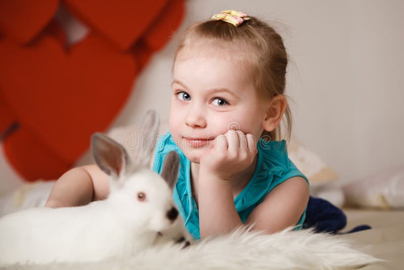 Cute Little Girl Playing with White Rabbits Stock Image - Image of pets ...