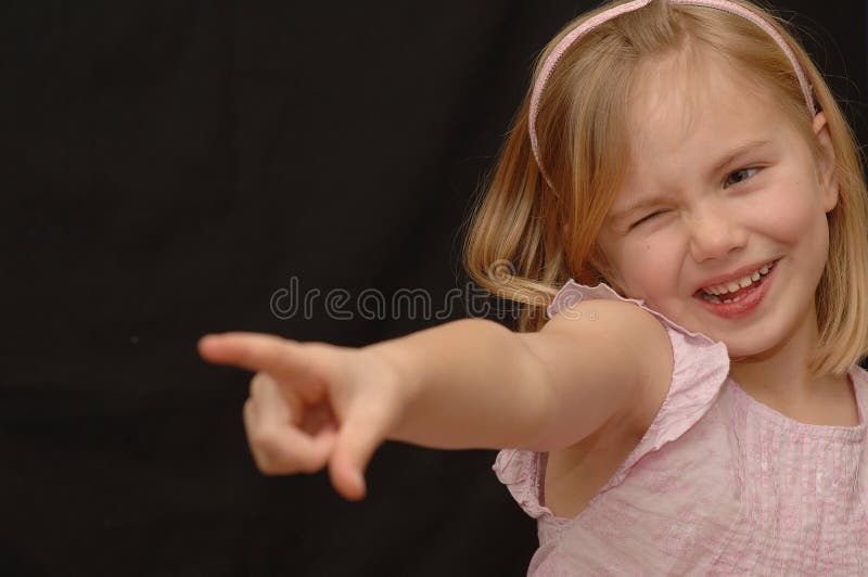 Cute little girl pointing stock photo. Image of designating - 2156894