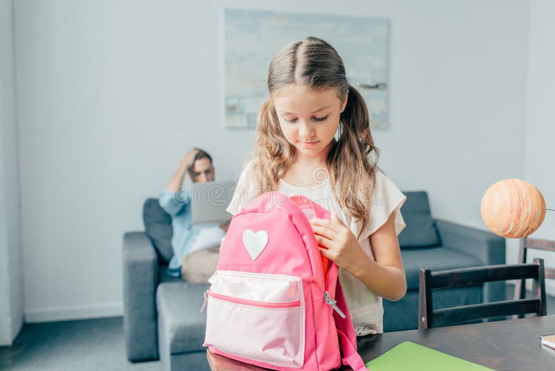 Cute Little Girl Preparing Backpack Stock Photo - Image of girl ...