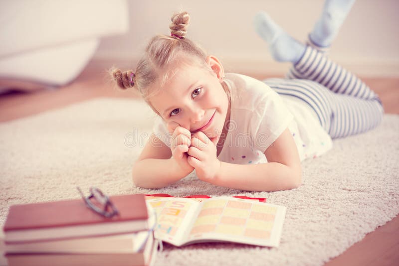 Cute Little Girl Read Book at Home Stock Image - Image of caucasian ...