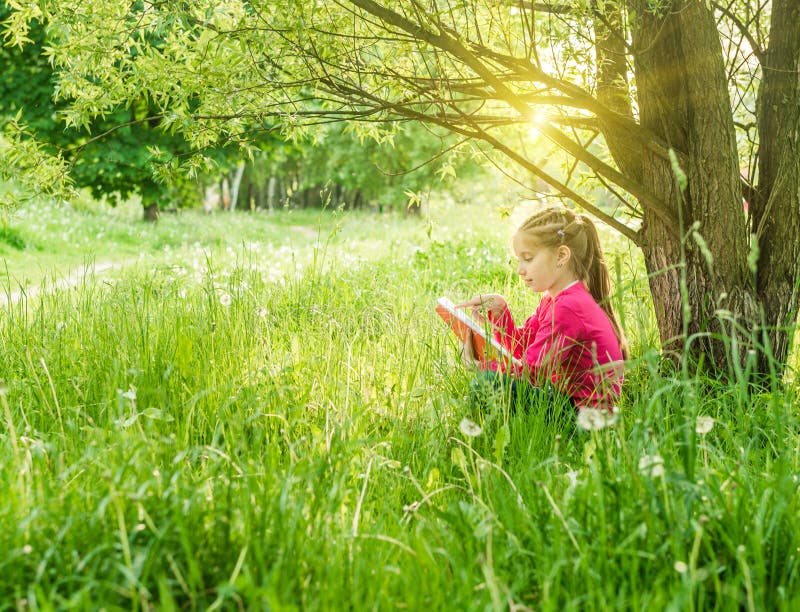 Girl Read On Tree