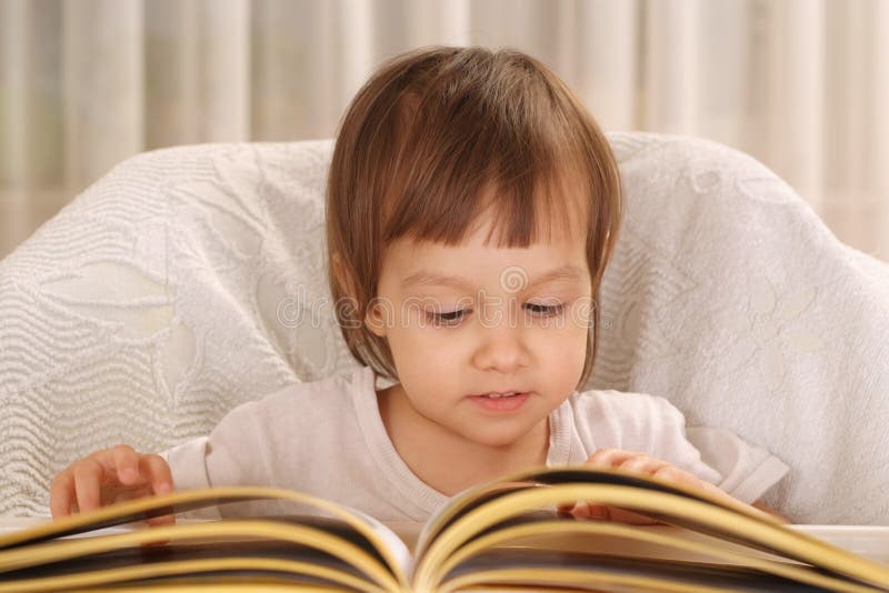 Cute Little Girl Reading a Book Stock Image - Image of happy, looking ...