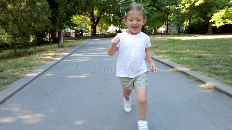 Cute Little Girl Running in the Park Stock Video - Video of nature ...