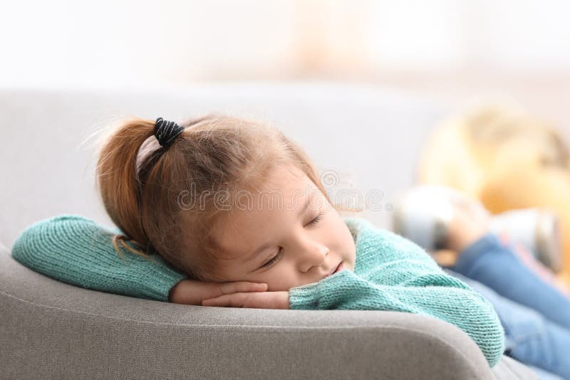 Cute Little Girl Sleeping on Sofa Stock Photo - Image of childhood ... Cute Little Girl Sleeping on Sofa Stock Photo - Image of childhood ...