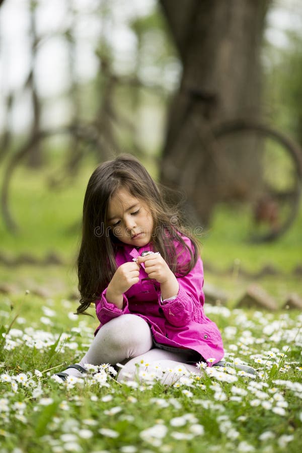 Cute Little Girl at Spring Field Stock Photo - Image of dress, nature ...