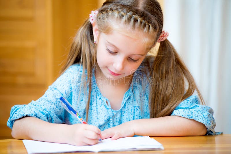 Cute little girl studying stock photo. Image of little - 47524256