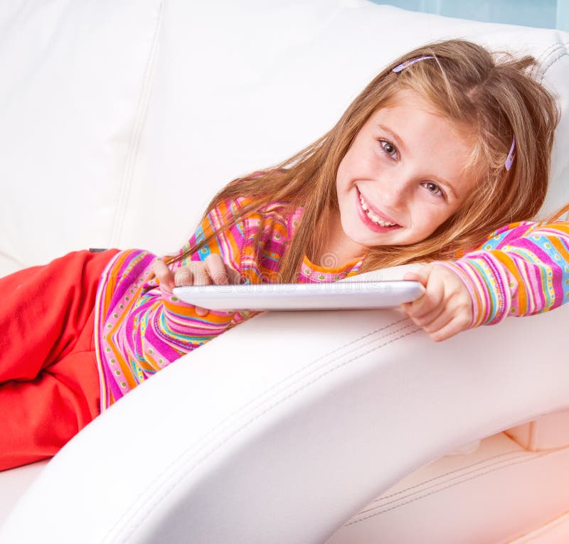 Cute Little Girl with the Tablet Stock Photo - Image of expressing ...