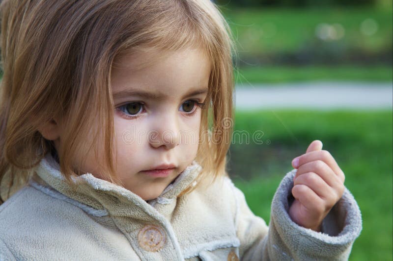 Cute Little Girl with Thoughtful Look Stock Photo - Image of healthy ...