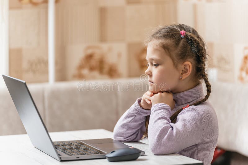 Cute Little Girl Using Laptop Computer for Online Learning Stock Image ...