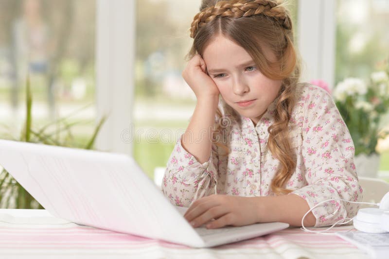 Smiling Little Girls Using a Laptop Stock Photo - Image of attractive ...