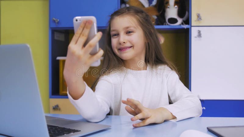 Cute Little Girl Using Modern Smartphone Stock Image - Image of ...