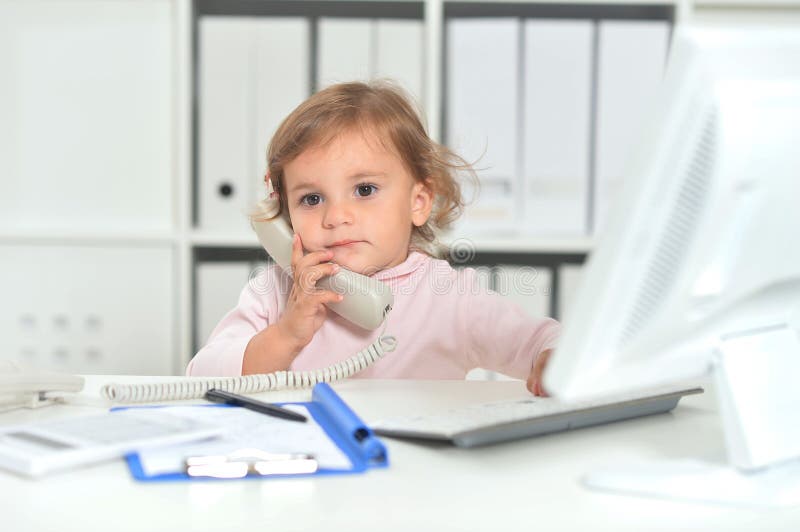 Cute Little Girl Using Phone in Office Stock Image - Image of happy ...