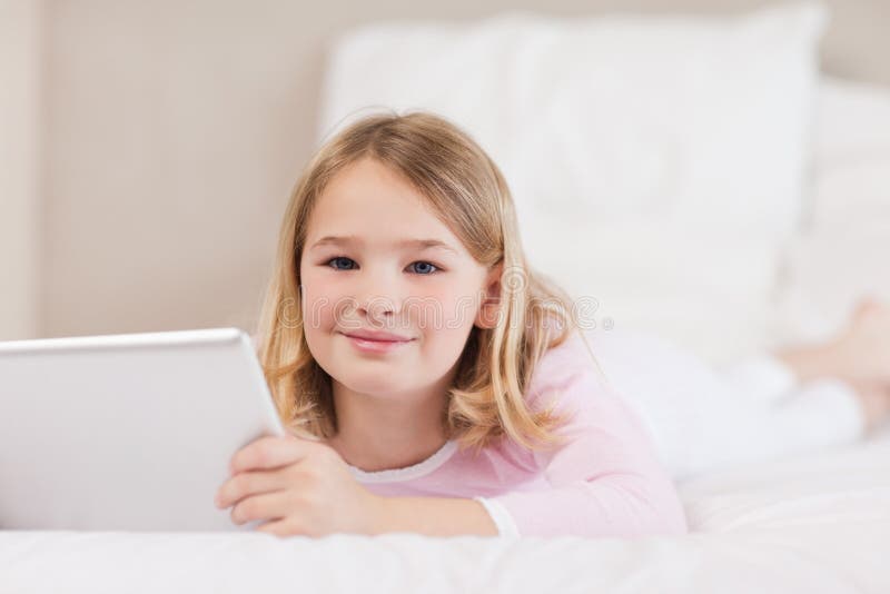 Cute Little Girl Using a Tablet Computer Stock Photo - Image of ...