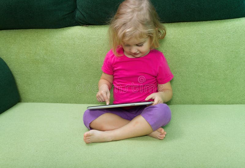 Cute Little Girl Using Tablet Computer Stock Image - Image of indoors ...