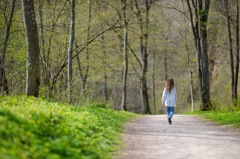 Cute Little Girl Walking Away Stock Image - Image of happiness ...